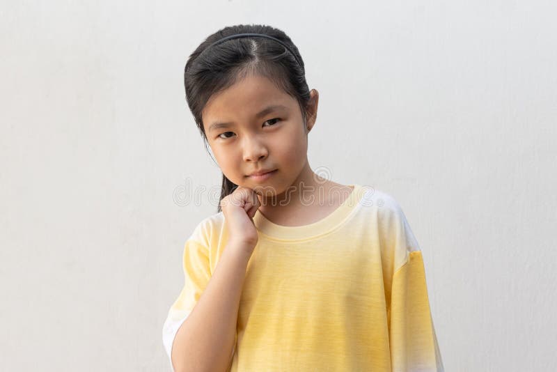 Young and Cute Asian Girl Thinking Stock Image - Image of adorable ...