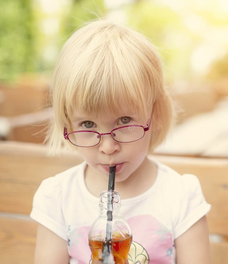 Child drink mineral water stock photo. Image of eyes, people - 5108574