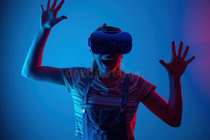 Young Cute Girl Playing Vr. with Creative Blue-red Light Stock Image ...