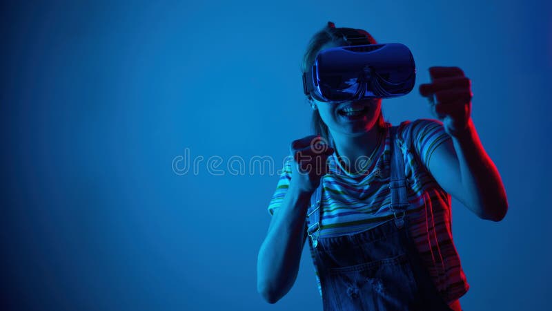 Young Cute Girl Playing Vr. with Creative Blue-red Light Stock Photo ...