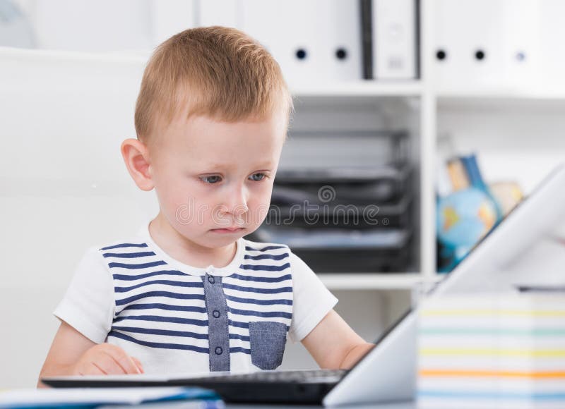 Young Cute Kid is Playing on Laptop Stock Image - Image of holiday ...