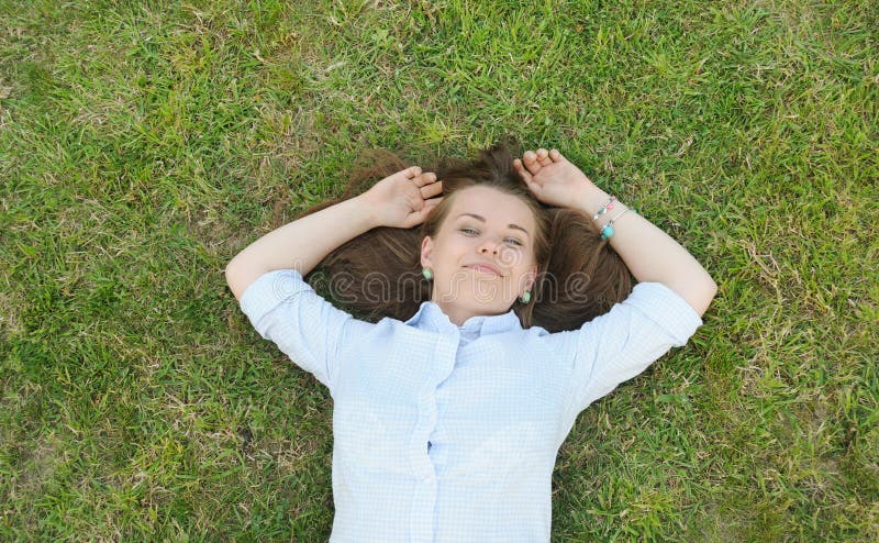 Young Cute Student Having Fun on the Grass in the Park Stock Photo ...