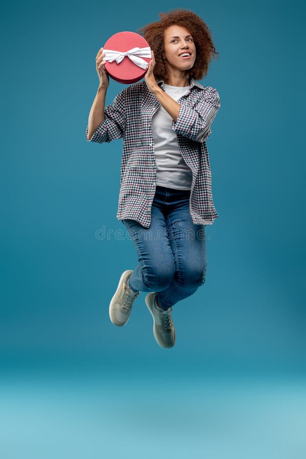 Young Cute Woman with a Present Box in Hands Looking Excited Stock ...