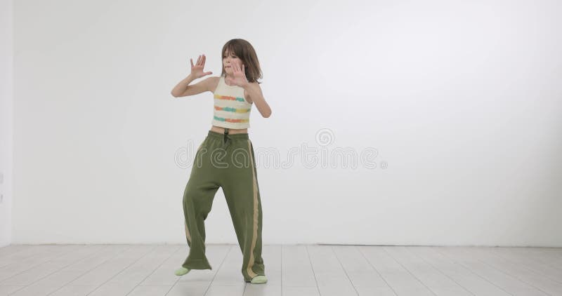 Teenage Dancer Girl Expresses Musical Dance Creativity and Smooth ...