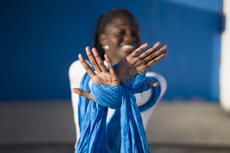Young Dancer Showing Her Hands Tied with Blue Cloth Stock Photo - Image ...