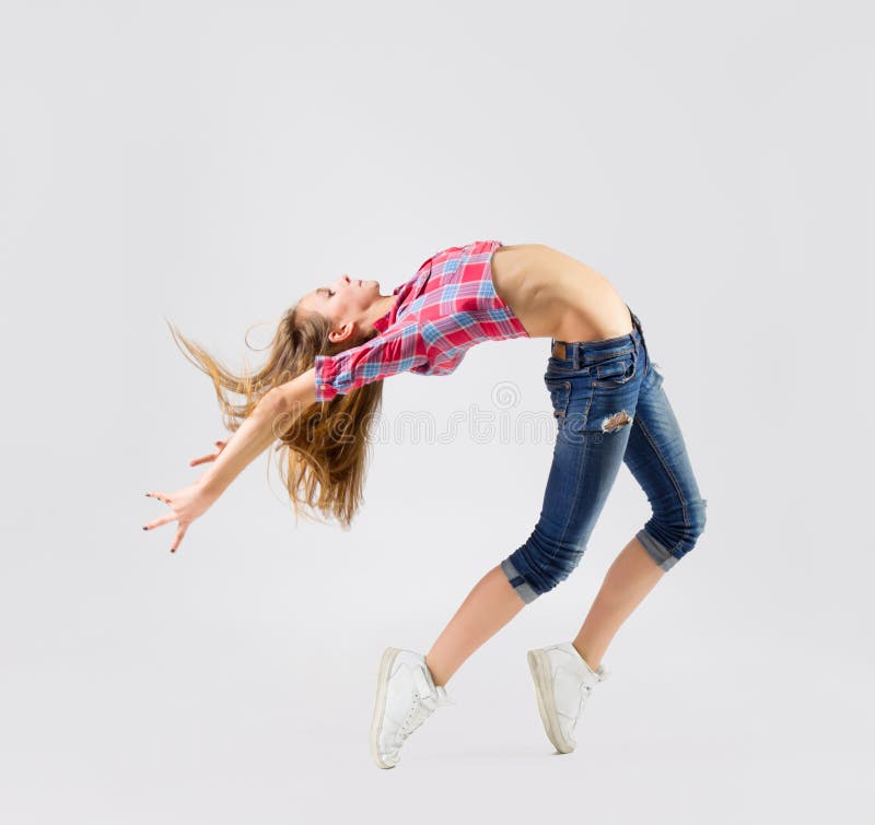 Young Dancing Girl in Jeans Stock Image - Image of grey, elegance: 66998301