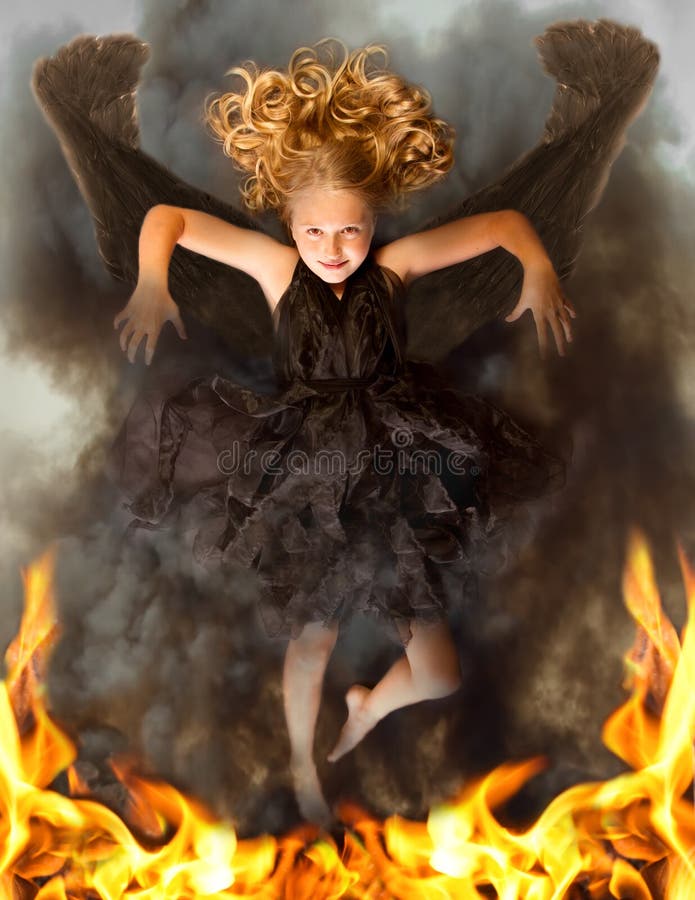 Young Dark Angel Rising from the Flames Stock Image - Image of dress ...