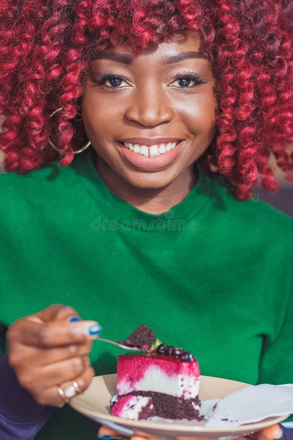 Young Dark Skinned Woman Dressed In Casual Clothes Holding Cup Of Hot