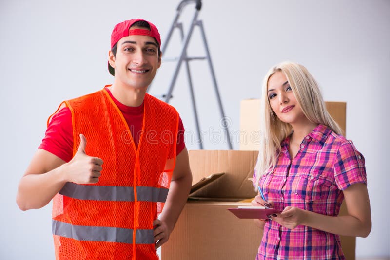 The Young Delivery Assistant Delivering To Home Stock Image - Image of ...