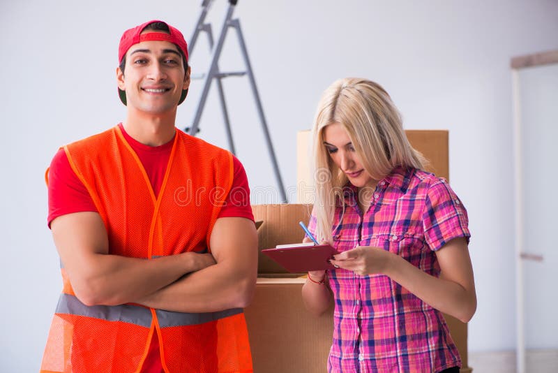 The Young Delivery Assistant Delivering To Home Stock Image - Image of ...