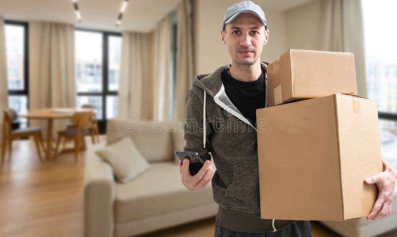 Young Delivery Man Standing with Parcel Post Box Stock Image - Image of ...