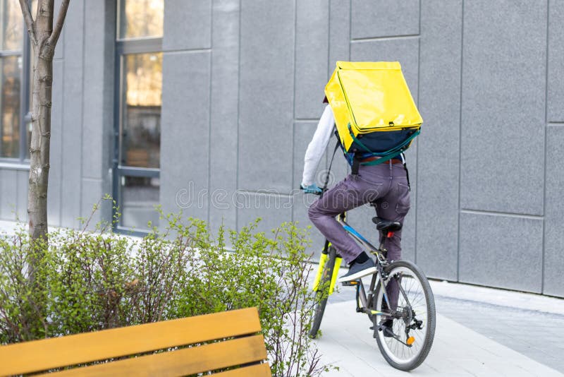 Young Delivery Man with Yellow Backpack Takeaway Concept Stock Image ...