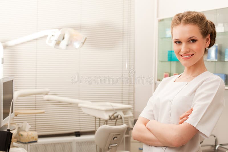 Young dental assistant stock photo. Image of chair, indoors - 13930894