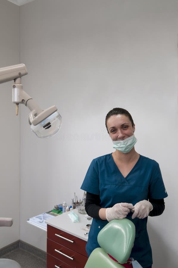 Dental Doctor Treating a Male Patient in Hospital. Stock Image - Image ...