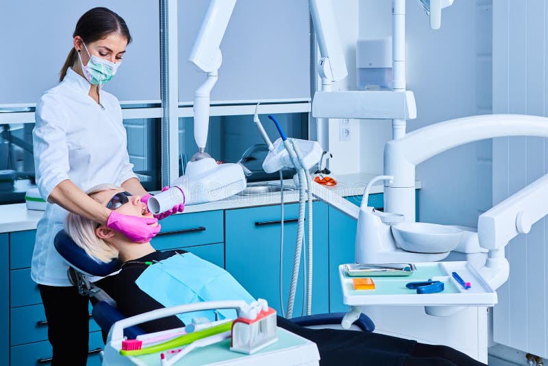 Young Dentist at Work in the Office. Stock Photo - Image of healthcare ...