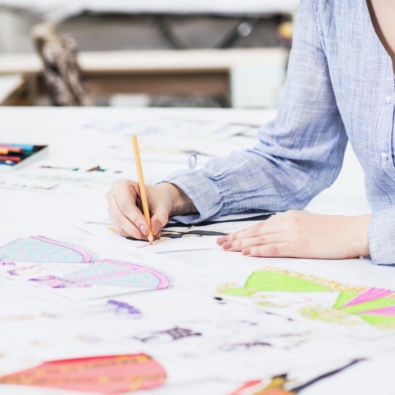 Young Designer Draws Sketches of Clothes. Stock Photo - Image of ...