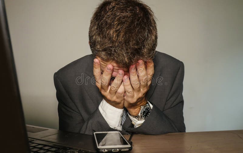 Young Desperate and Depressed Business Man Suffering Problem and ...