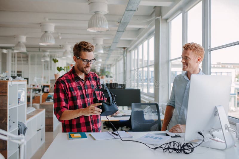 Young Developers Testing Virtual Reality Glasses in Office Stock Photo ...
