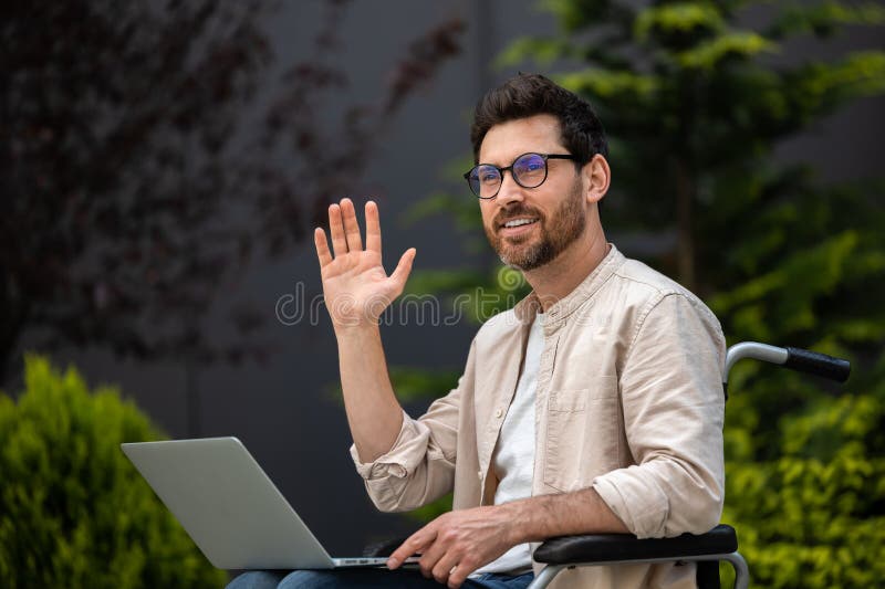 Young Disabled Man in Eyeglasses Waving His Hand Stock Image - Image of ...