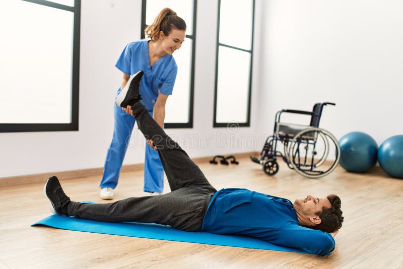Young Disabled Woman Sitting on Wheelchair Making Mobility Exercise ...