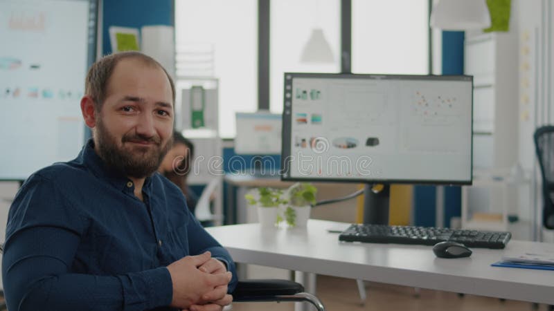 Young Disabled Paralized Handicapped Man Project Manager Looking at ...