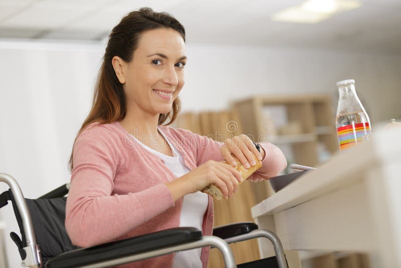 Young Disabled Woman Having Lunch Stock Photo - Image of paralyzed ...