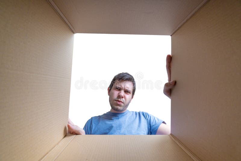 Looking inside the box stock photo. Image of brown, handsome - 9130756
