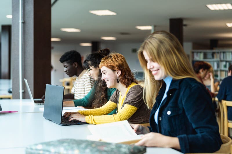 Young Diverse People Studying in Library Stock Image - Image of ...