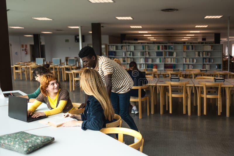 Young Diverse People Studying in Library Stock Photo - Image of exams ...