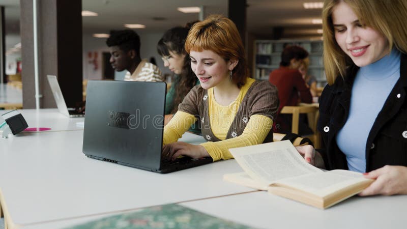Young Diverse People Studying in Library Stock Video - Video of african ...