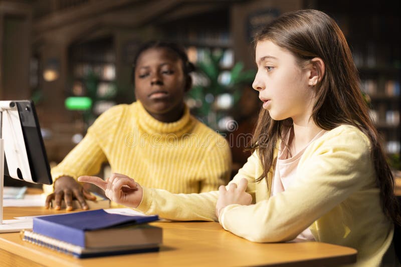 Young Diverse Students Attending Online Class Via Video Call Library ...