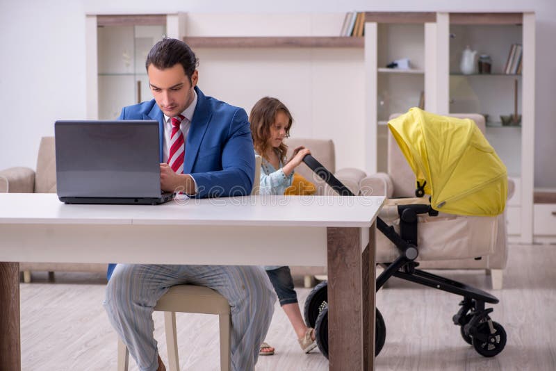 Young Divorced Father of Two Children Working from House Stock Photo ...