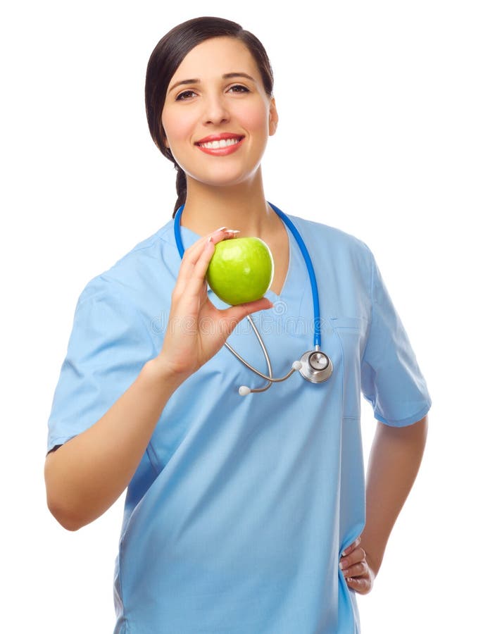 Young doctor with apple stock photo. Image of female - 29108562