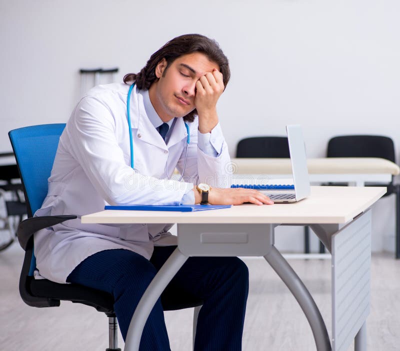 Young Doctor Being Tired after Night Shift Stock Photo - Image of ...