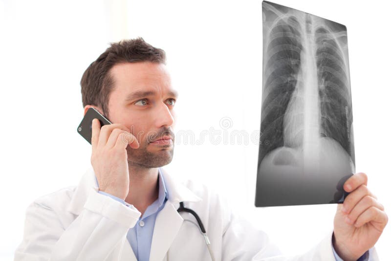 Young Doctor Calling Patient for Results Stock Image - Image of ...