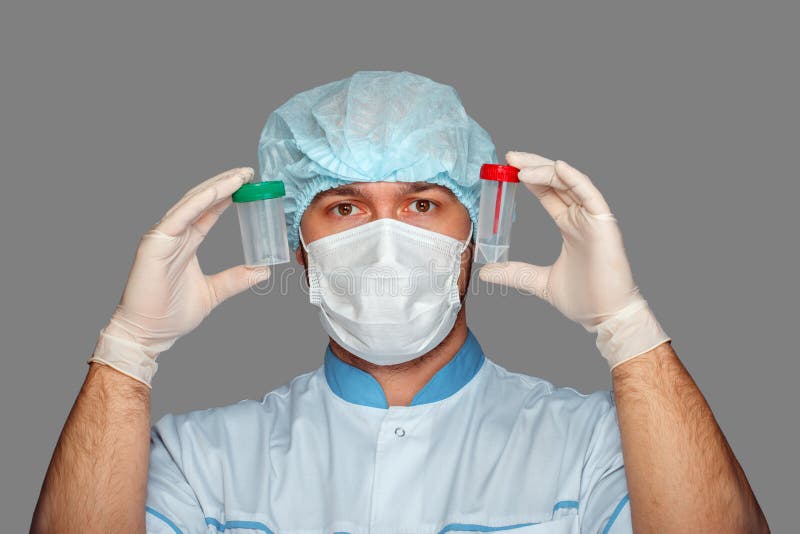 Young Doctor with Container for Analysis Stock Photo - Image of ...