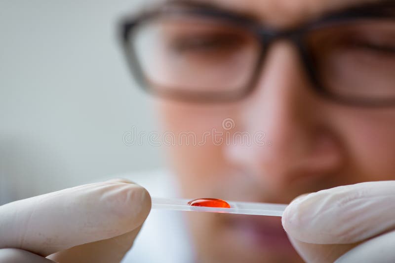 The Young Doctor Doing the Blood Test Stock Image - Image of glass ...