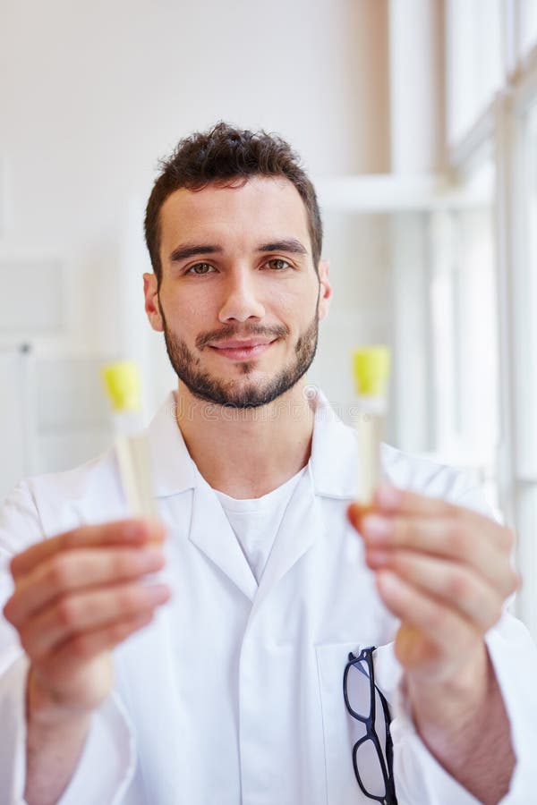 Young Doctor with Experiment Samples Stock Photo - Image of alcohol ...