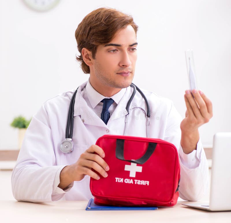 Young Doctor with First Aid Kit in Hospital Stock Image - Image of care ...