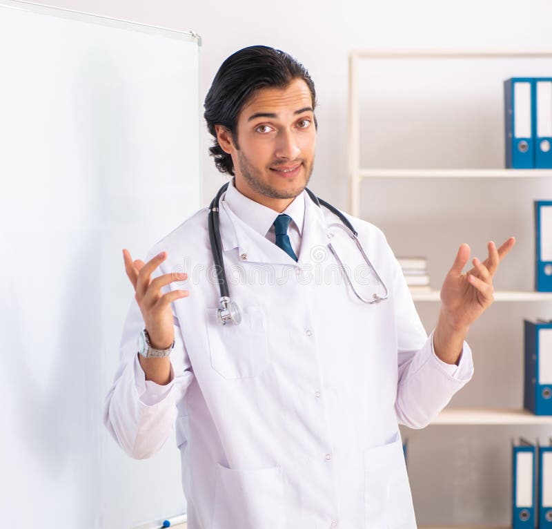 Young Doctor in Front of Whiteboard Stock Image - Image of examination ...
