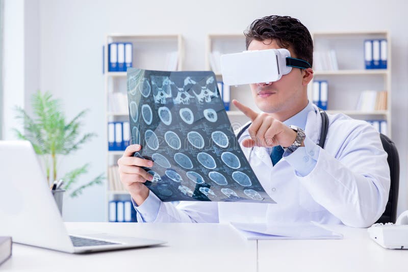 The Young Doctor Looking at Mri Scan through Vr Glasses Stock Photo ...