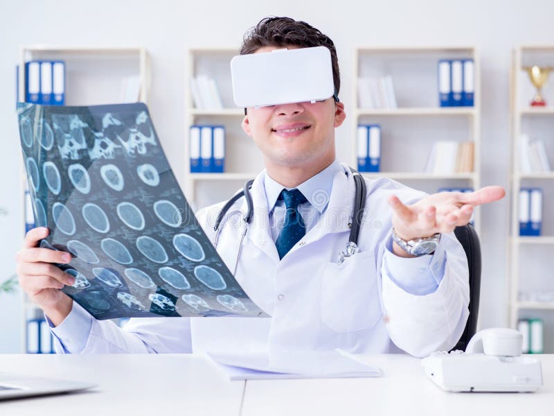 Young Doctor Looking at MRI Scan through VR Glasses Stock Photo - Image ...