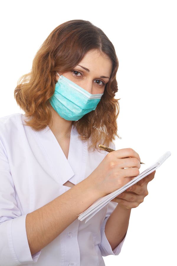 Young Doctor Makes an Entry in the Notebook Stock Photo - Image of ...