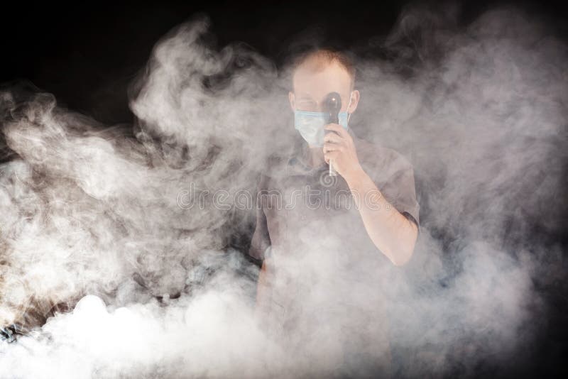 Young Doctor in a Mask in Smoke Stock Image - Image of caucasian ...