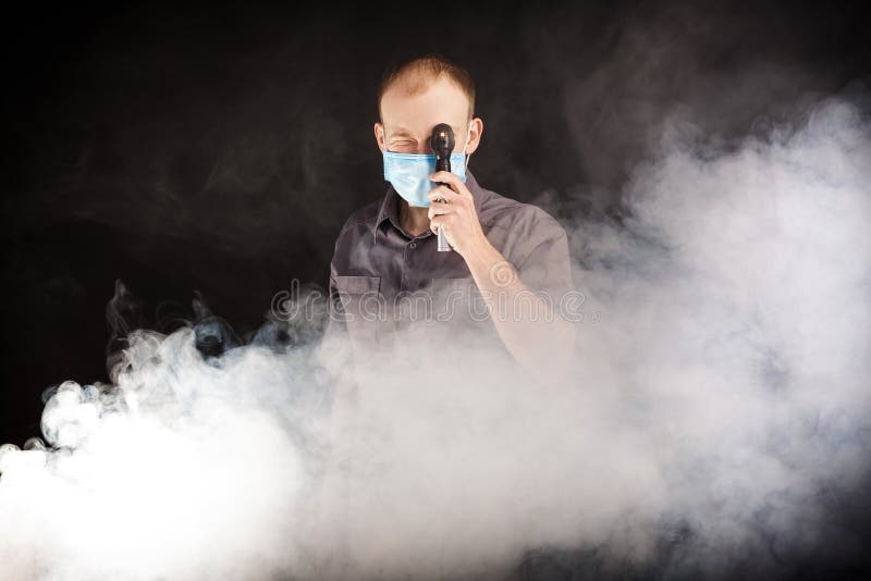 Young Doctor in a Mask in Smoke Stock Photo - Image of mask, head: 90862226
