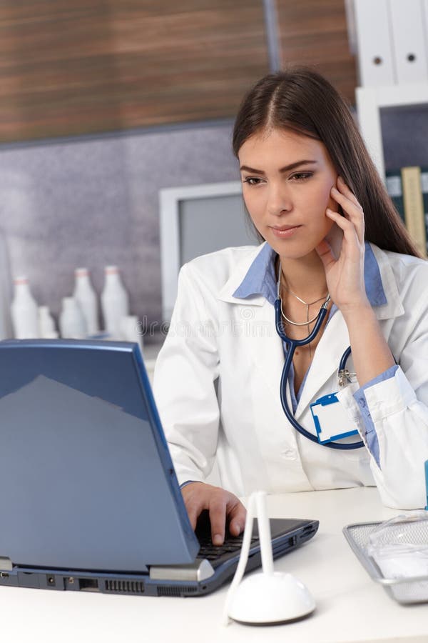 Doctor using computer stock photo. Image of horizontal - 7674694