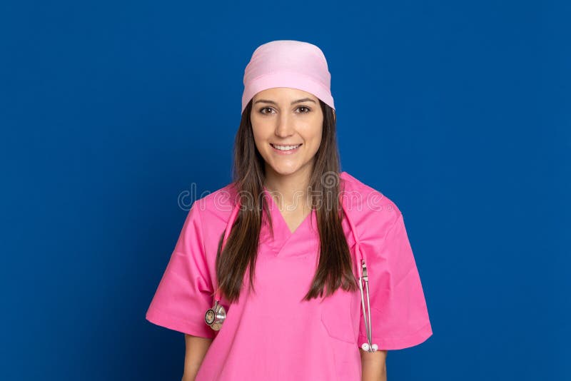 Young Doctor with a Pink Uniform Stock Photo - Image of review ...