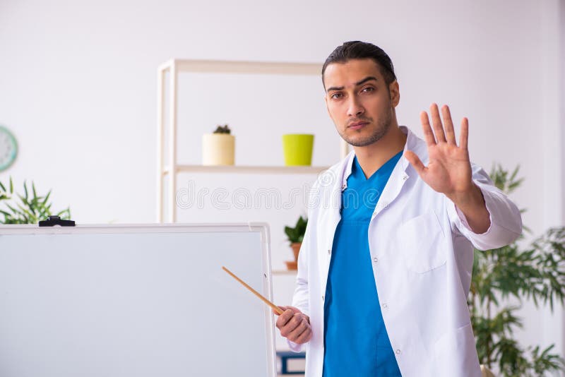 Young Male Doctor in Presentation Concept Stock Image - Image of ...
