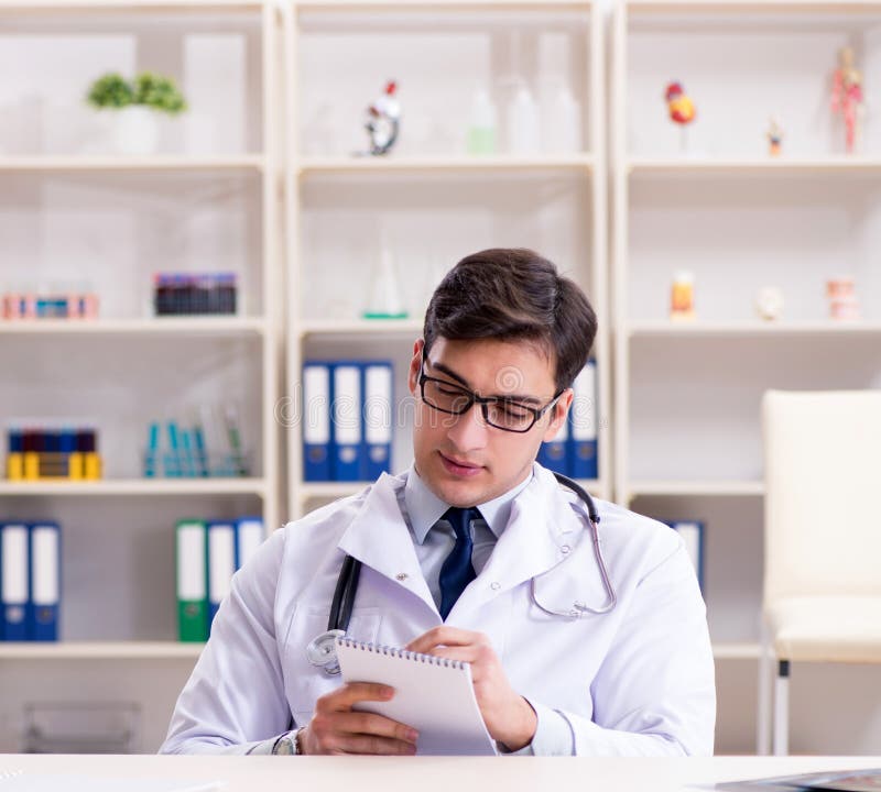 Young Doctor Sitting in the Office Stock Image - Image of medical ...