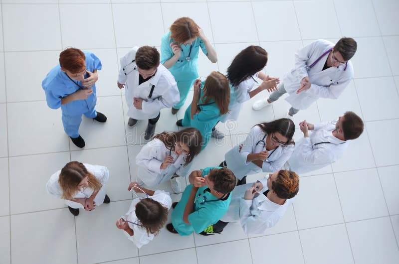 Young Doctor Standing in Front of a Group of Interns Stock Image ...
